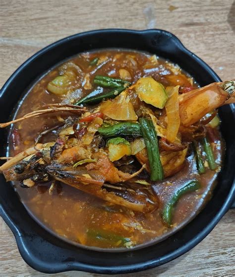 And X22spicy Prawn Delight In Rich Sauce With Vegetablesand X22 Stock