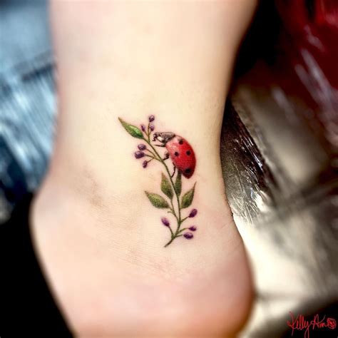 Ladybugs On Flowers Tattoo