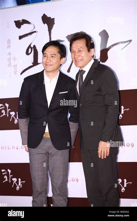 Hong Kong Actor Tony Leung Left And South Korean Actor Ahn Sung Ki Pose At A Vip Preview For