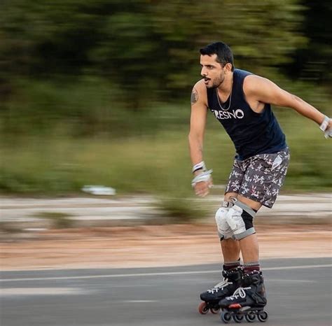 Download Hot Bearded Guy Rollerblading Wallpaper