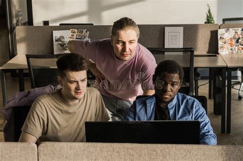 Team Of Professional Software Developer And Brainstorming And Programming On Site Software And