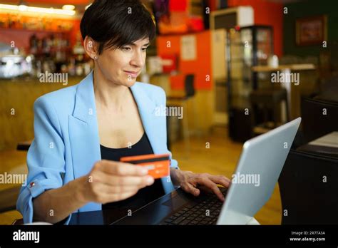 Adult Woman Using Debit Card For Online Payment Stock Photo Alamy
