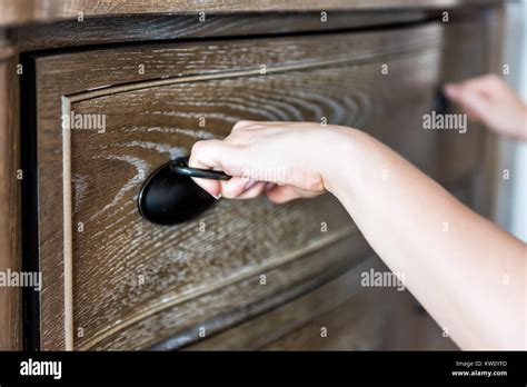 Closeup Of Wooden Chest Drawer In Bedroom With Natural Light In Staging Home House Apartment