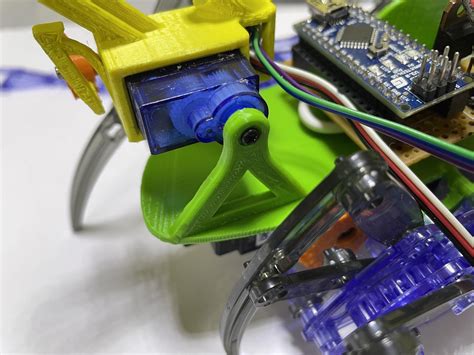 Bluetooth Controlled Spider Robot That Shoots 15 Steps With