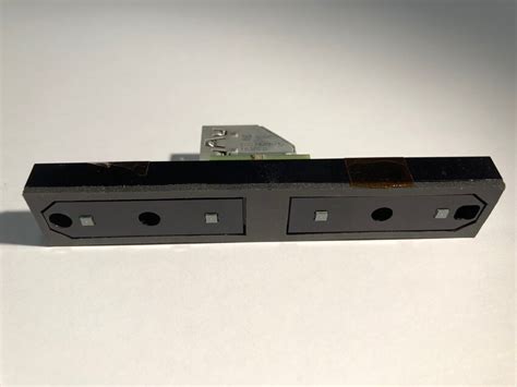 Left Sipm Module Showing The 4 Square Sipms Right Sipm Module Top View Download Scientific