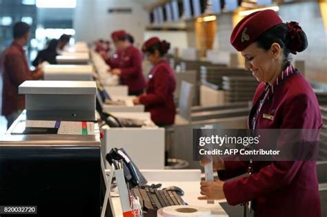 Qatar Airways Cabin Crew Photos And Premium High Res Pictures Getty Images