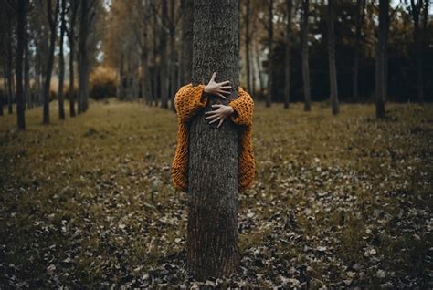 Premium Photo Woman Hugging A Tree