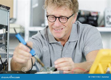 Man Testing Circuit Board In Office Stock Photo Image Of Research Microchip 174011156