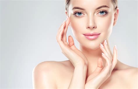 Beautiful Young Woman With Clean Fresh Skin Touch Own Face Facial