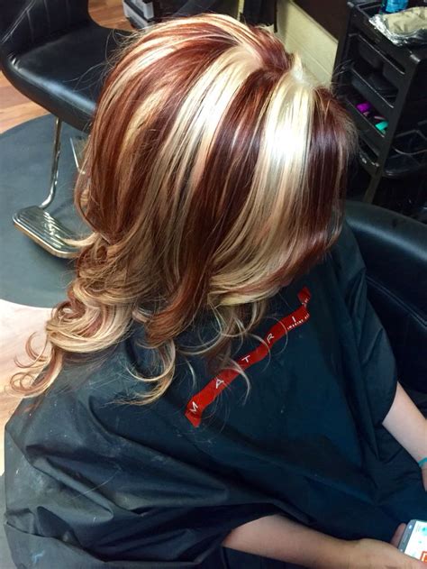 Blonde Hair With Chunky Red Highlights