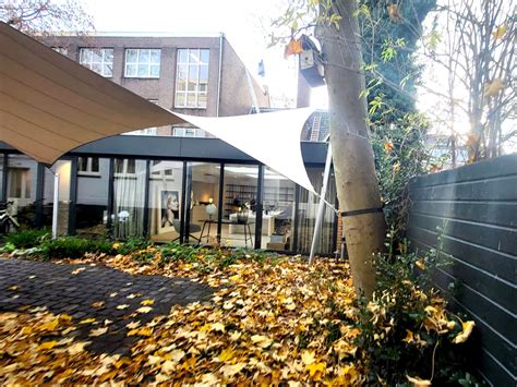 Semi Permanent Removable Shade Sail Structure For A Lanai Area Of A Modern House In Kapaʻa