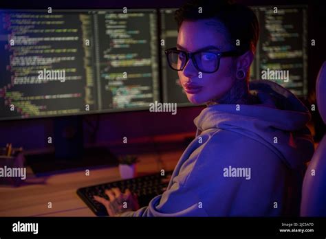 Portrait Of Intelligent Hipster Hacker Girl Sitting Chair Keyboard Typing Operating Script Dark