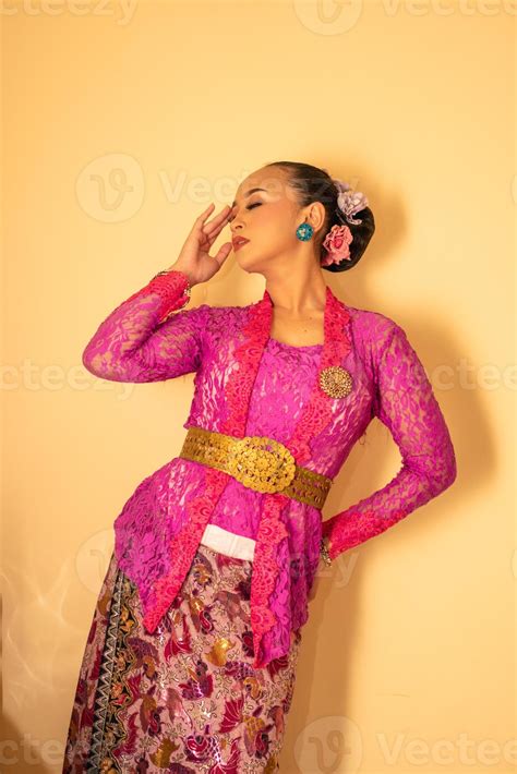 Balinese Woman Wearing A Pink Dress Called Kebaya From Indonesia S