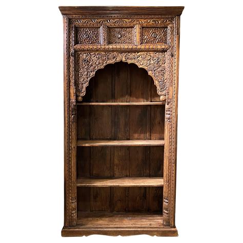 Antique Carved Wooden Indian Doorway Converted To A Bookcase Dentil