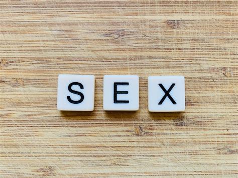 Premium Photo Directly Above Shot Of Sex Text On Table