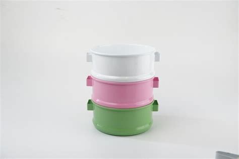 Premium Photo Close Up Of Multi Colored Container Over White Background