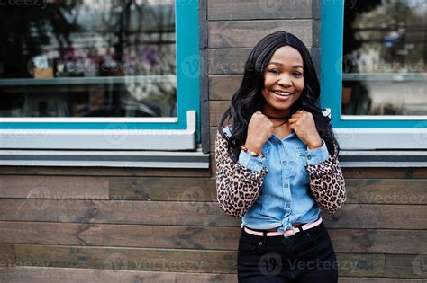 Hipster African American Girl Wearing Jeans Shirt With Leopard Sleeves