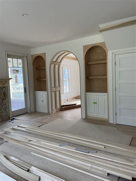 Cozy Living Room With Built In Bookshelves Arched Doorway Ideas Arch