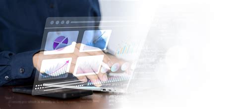 Businessman Using Laptop Computer Analyzing Sales Data And Financial