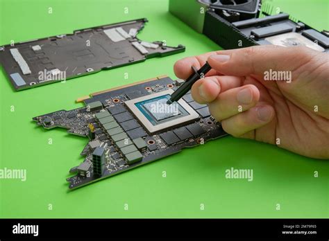 Changing The Thermal Paste On The Graphics Processor Disassembled