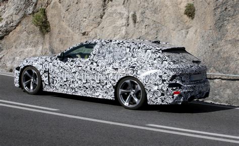 2026 Audi Rs6 Avant Shows Massively Flared Wheel Arches Oval Exhaust