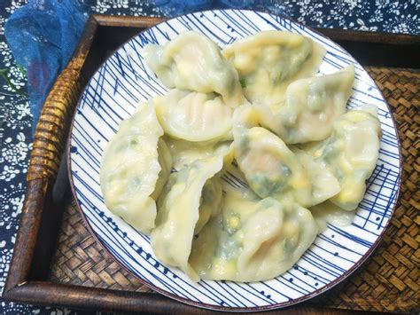 煮饺子时开锅下入易破皮牢记3步煮饺子不破皮不露馅 搜狐大视野 搜狐新闻