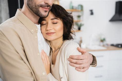 Man Hugging Smiling Brunette Woman At Stock Photo Image Of Wife Casual 270190958
