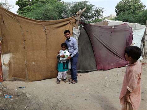 Distribution Of Clothes In A Katchi Akhuwat Clothes Bank