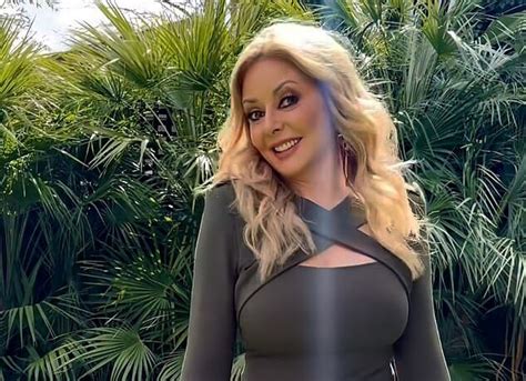 Carol Vorderman Flaunts Her Famous Curves In A Cut Out Top And Leather