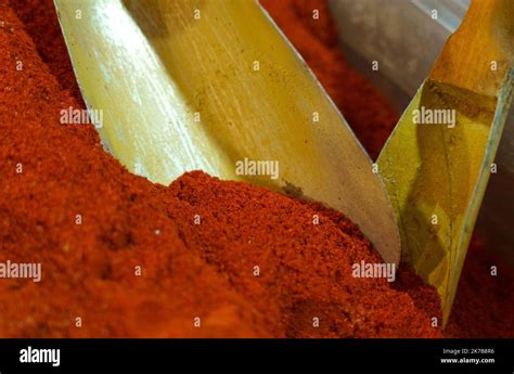 Close Up Of A Tray With Paprika Inside The Tray Is A Scoop For Pouring