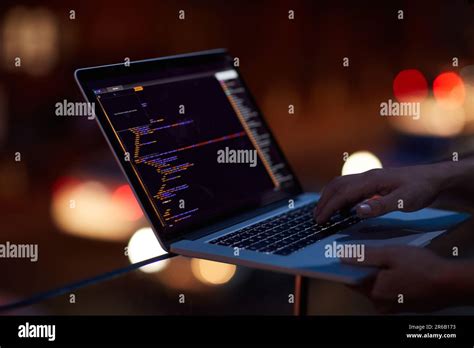 Hacker Programming And Laptop With Hands Of Person For Ransomware