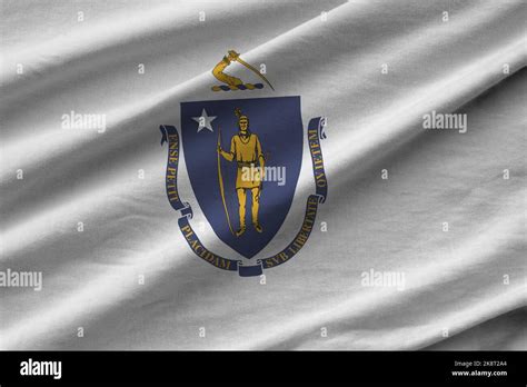 Massachusetts Us State Flag With Big Folds Waving Close Up Under The