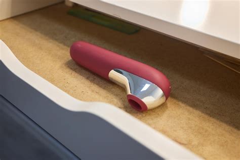 Premium Photo Different Sex Toys In Open Chest Of Drawers