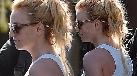 Britney Spears Dresses Down In Scruffy Tracksuit With Messy Hair Do