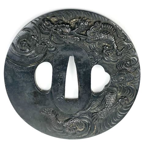 Lot 7 A Japanese Bronze Tsuba Edo Period