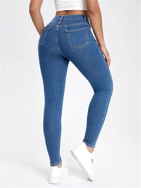 Shein Essnce Jeans Ajustados Con Bolsillo Oblicuo Moda De Mujer