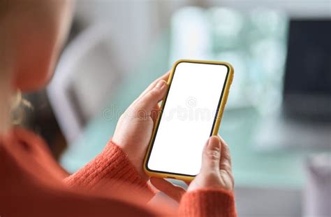 Over Shoulder View Of Woman Holding Smartphone White Mock Up Screen