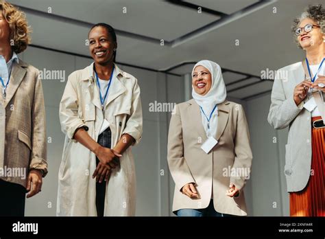 Group Of Diverse Businesswomen Networking At A Conference Representing Teamwork And