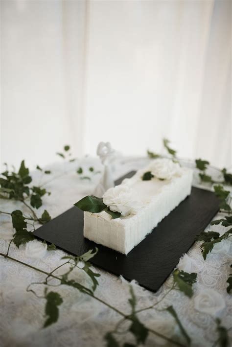 A Small Simlpe White Wedding Cake At Intimate Wedding In Vipava Valley