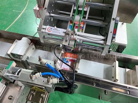 bottle automatic feeding and box packaging machine with instruction manual automatic feeder