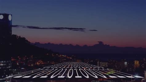 Premium Stock Video Animation Of Binary Coding Over Cityscape
