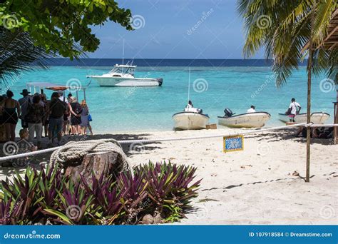 Beautiful Beach With Pristine Turquoise Water In Conflict Island Papua