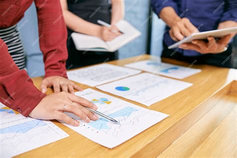 Free Photo Business People Analyzing Document