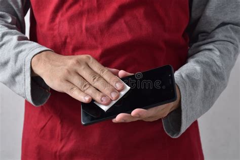 Men Cleaning Smartphone Screen With Alcohol Stock Image Image Of Disinfection Hygiene