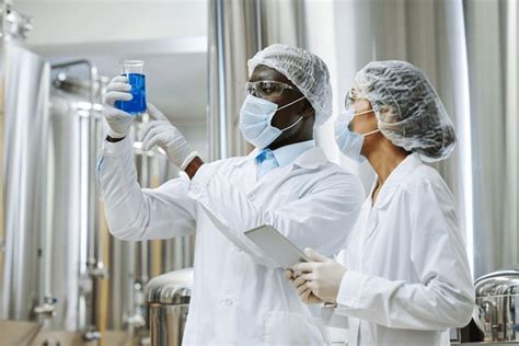 5 couple engineers conducting scientific experiment royalty free photos