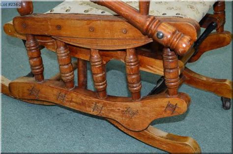 Antique Glider Rocker With Upholstered Seat And Back Purportedly Made