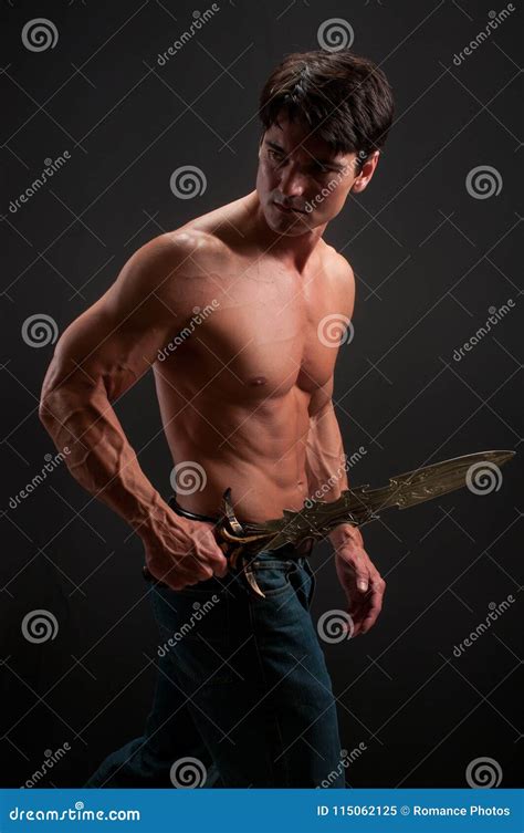 The Man Is Holding A New Age Sword Stock Image Image Of Defiant Determined 115062125