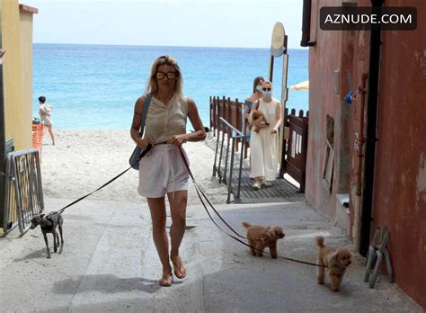 Michelle Hunziker Enjoys A Day On The Beach In Varigotti AZNude