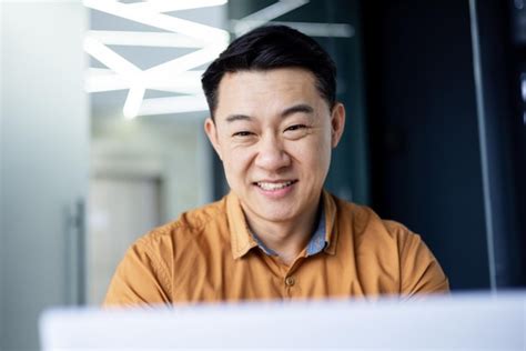 Premium Photo Successful Asian Programmer Developer Working With