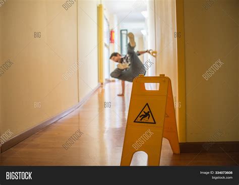 Man Slips On Wet Floor Image And Photo Free Trial Bigstock